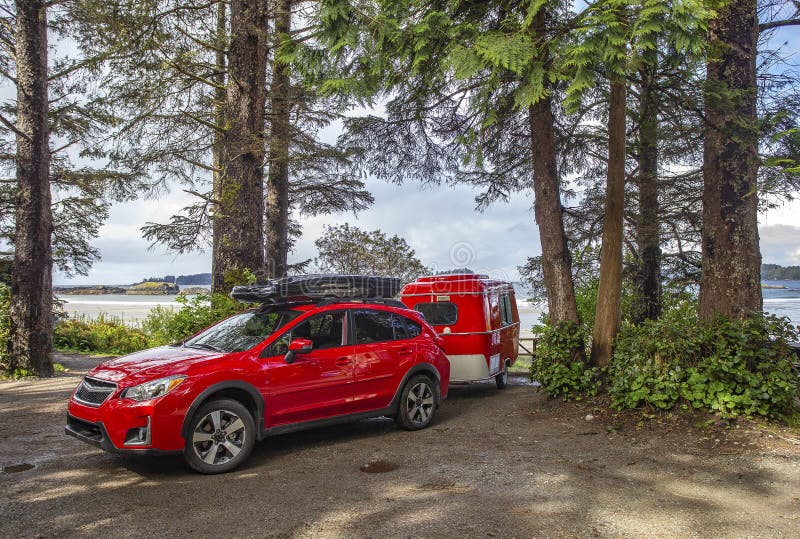Red car with camper editorial photo. Image of imported - 144447061