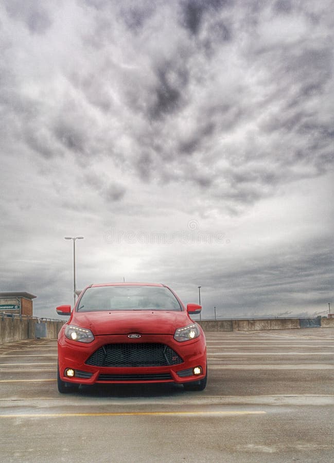 Red car and clouds editorial image. Image of focus, cloudy - 46213305