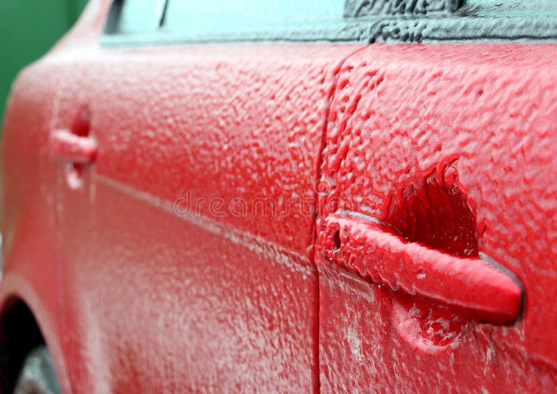 The Red Car is Covered with Ice. Icy Surface of the Car. Stock Image ...