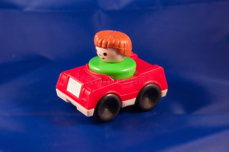 Red car dark driver stock image. Image of toys, driver - 36632667
