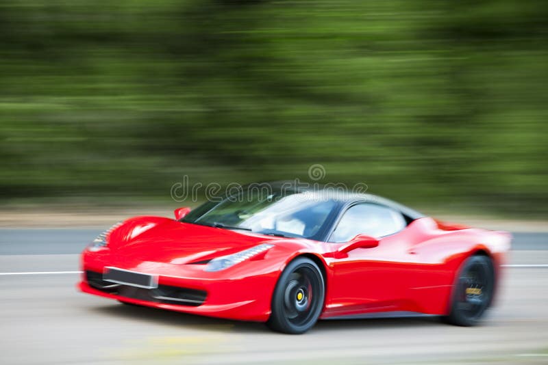 Red Car Driving Fast on Country Road Stock Image - Image of lifestyles ...