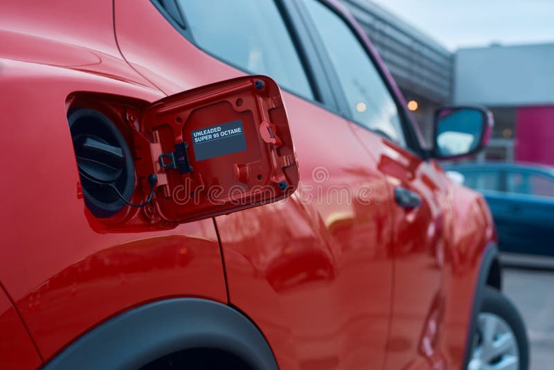 Red Car with the Gas Tank Opening Stock Photo - Image of tank, parking ...