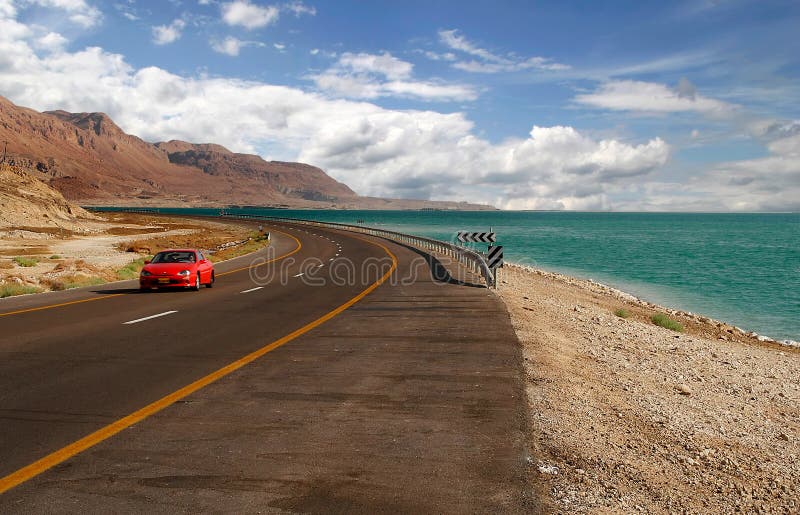 Red car on a highway. stock photo. Image of drive, nature - 22306294