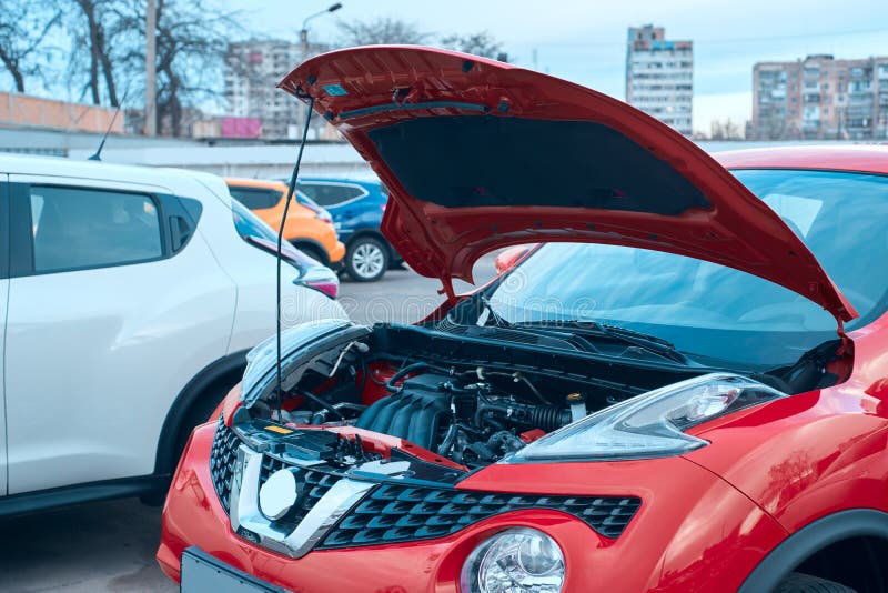Red car with an open hood stock image. Image of industry - 63454003