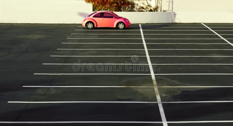 Red car on parking lot stock image. Image of beetle, green - 29478149