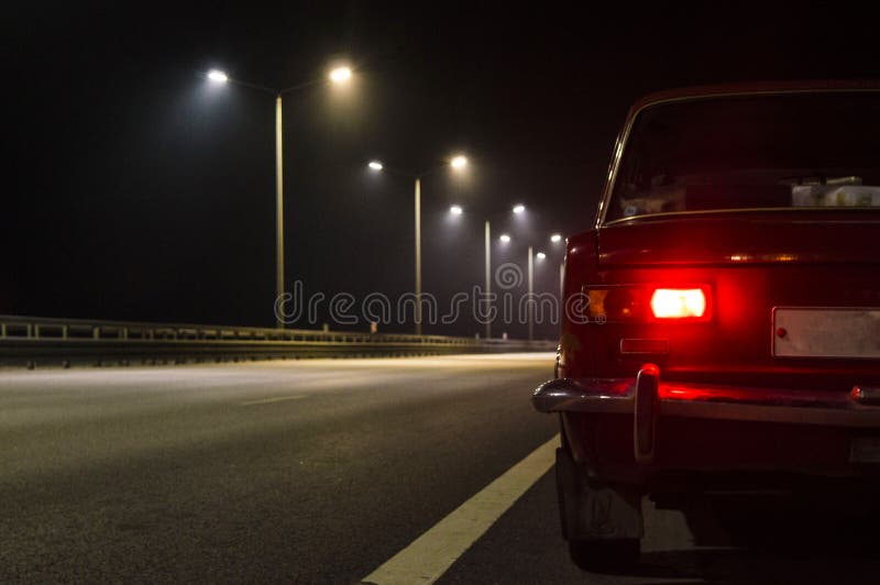 Red Car on the Road at Night Stock Image - Image of trip, lights: 116882843