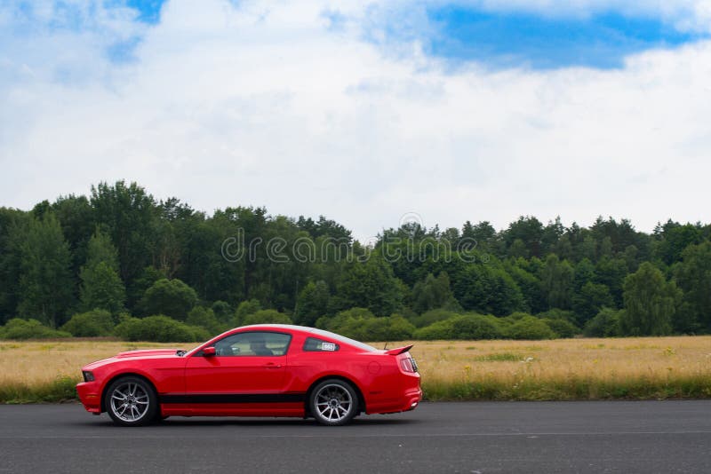 Red car rushing stock photo. Image of country, drive - 211261834