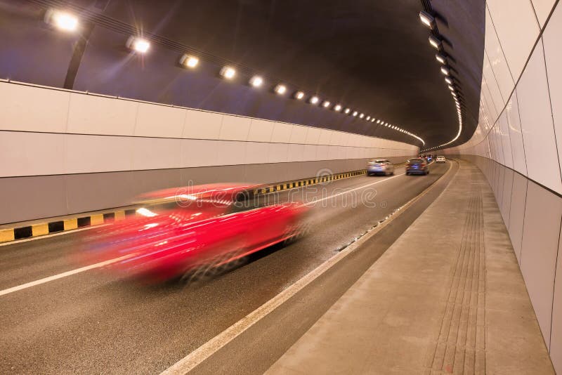 Red Car Rushing Through A Tunnel Stock Image - Image of dark, rush ...