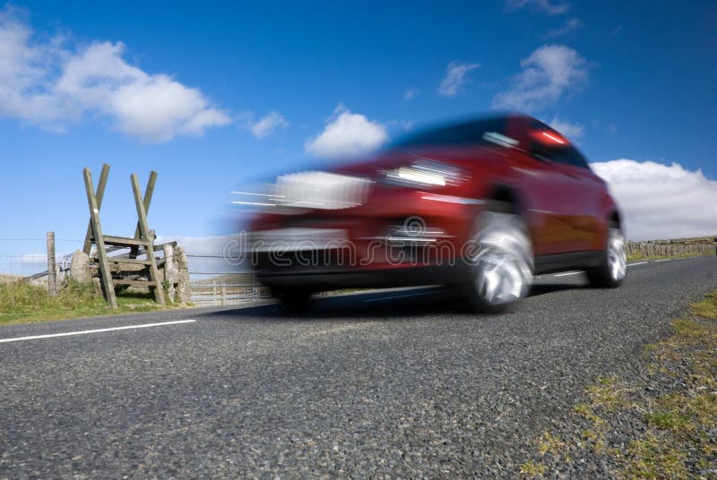 Red Car Speeding on Empty Mountain Road Stock Photo - Image of empty ...