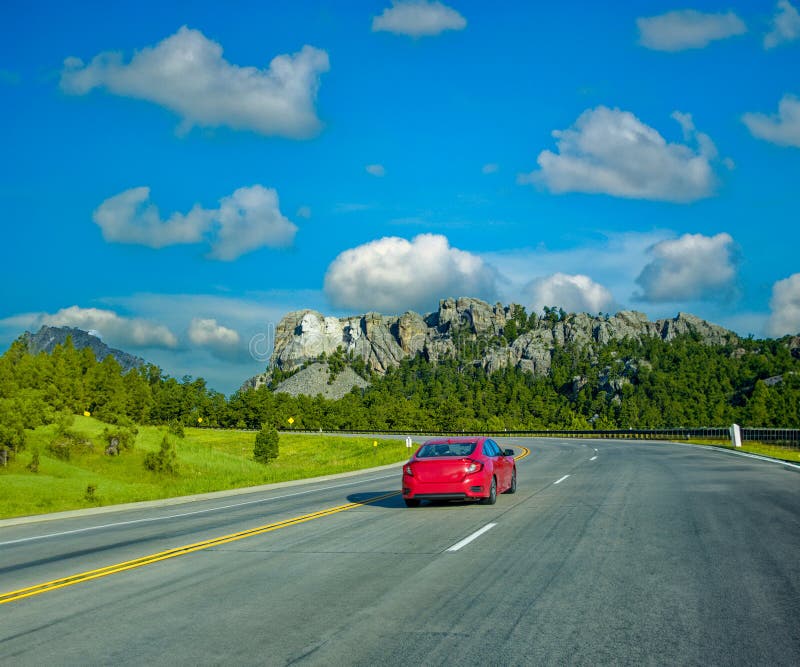 Red Car Speeding Up on the Road To Mount Rushmore Editorial Photography ...