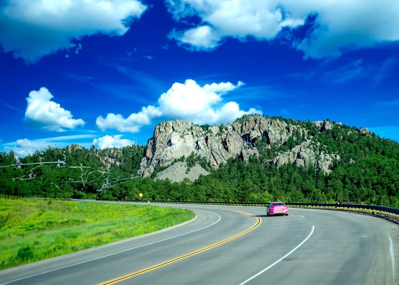 Red Car Speeding Up on the Road To Mount Rushmore Editorial Image ...