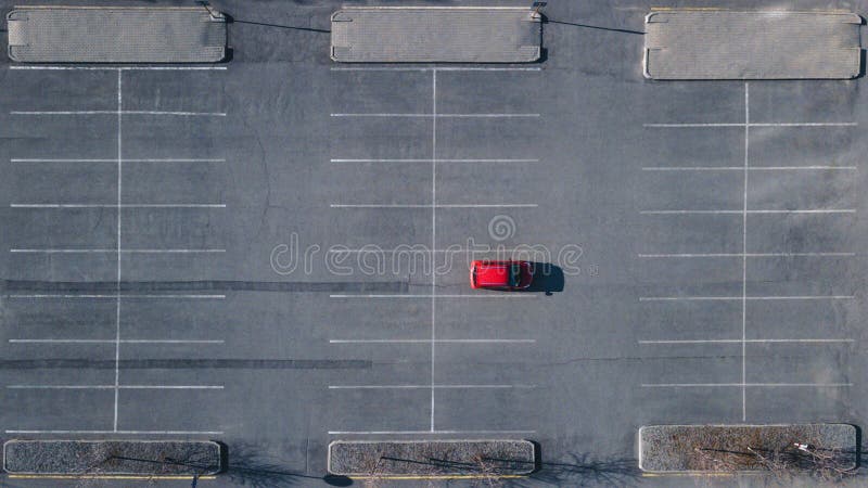 A Red Car is Standing Alone in the Parking Lot Stock Photo - Image of ...