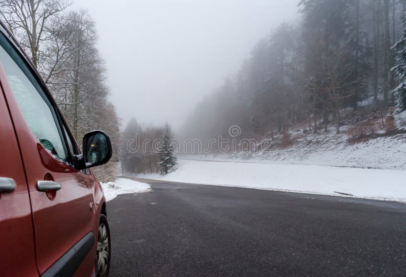 Red Car on the Winter Road in the Mountains, Forest with Snow Stock ...