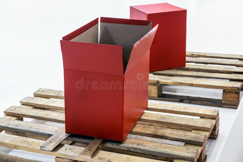 Empty Wooden Pallets Stacked in a Warehouse Stock Image - Image of ...