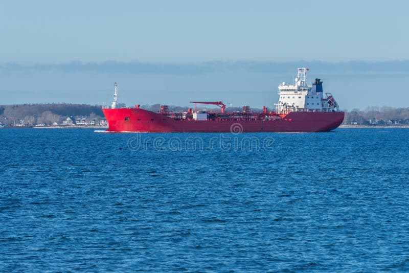 Red cargo barge at sea stock image. Image of delivering - 146403933