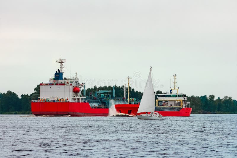 Red cargo ship at Riga stock photo. Image of sailing - 107202282