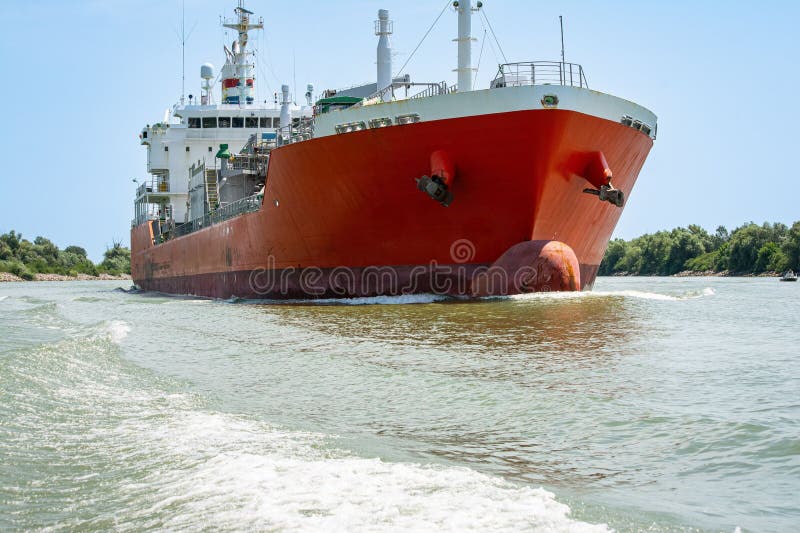 Red Cargo Ship on River stock image. Image of boat, ship - 340151079