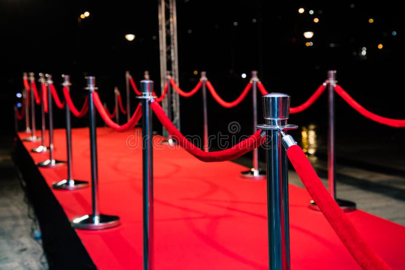 Red carpet with barriers stock image. Image of barrier - 174443483