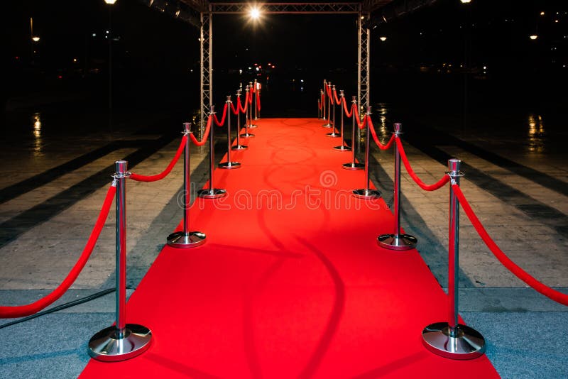 Red carpet with barriers stock image. Image of film - 174443299