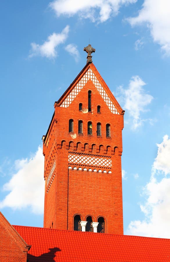 Red catholic church stock photo. Image of plants, orange - 73495774
