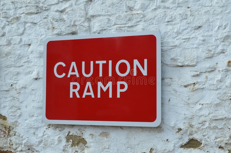 Red caution ramp sign. stock image. Image of mounted - 52567883