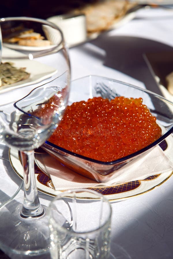 Red Caviar in a Glass Plate on the Holiday Stock Photo - Image of ...