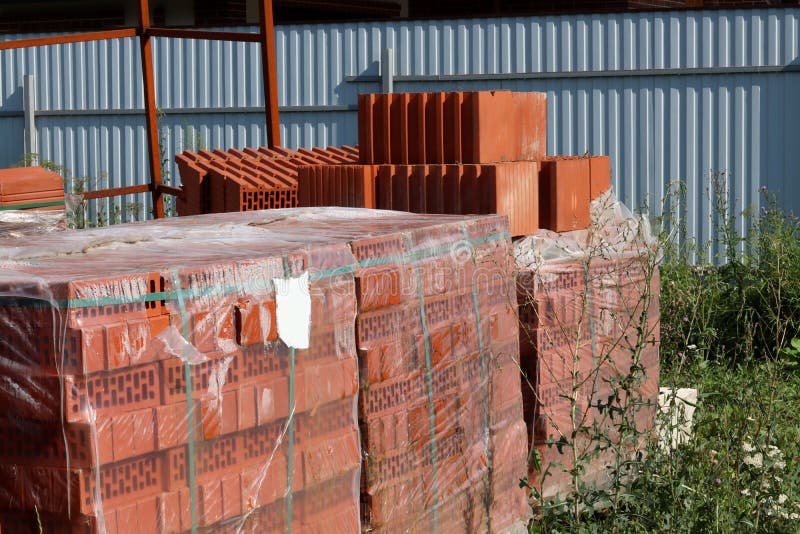 Packaging New Construction Red Brick on Pallets Stock Photo - Image of container, build: 254791146