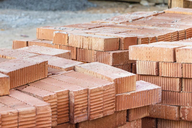 Red Ceramic Bricks Stacked on a Construction Site. Construction ...