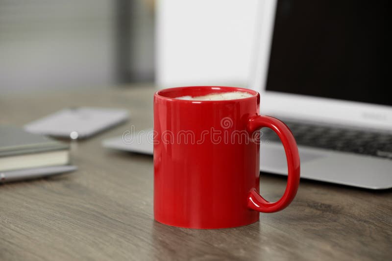 Red Ceramic Mug with Hot Drink on Wooden Table Desk at Workplace ...