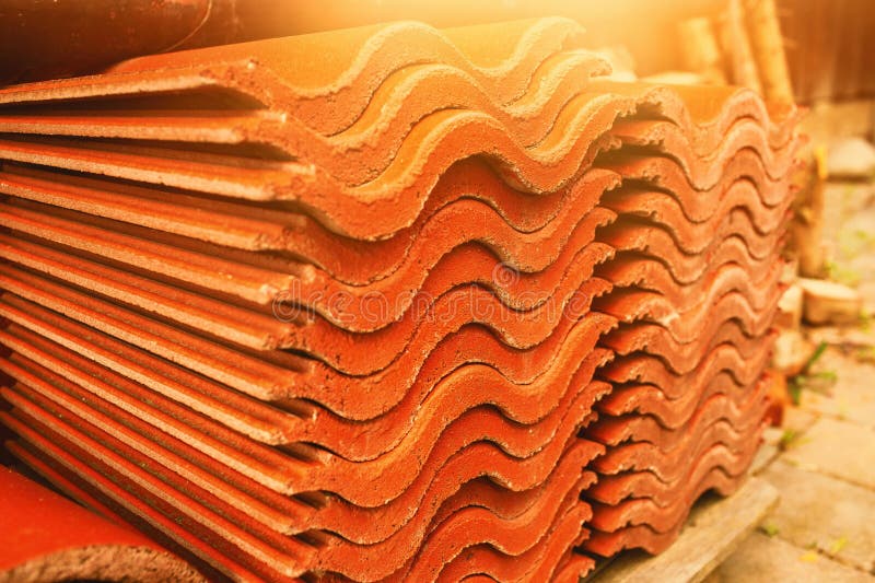 Red Ceramic Roof Tiles Stack in Backyard.High Quality Photo Stock Photo ...