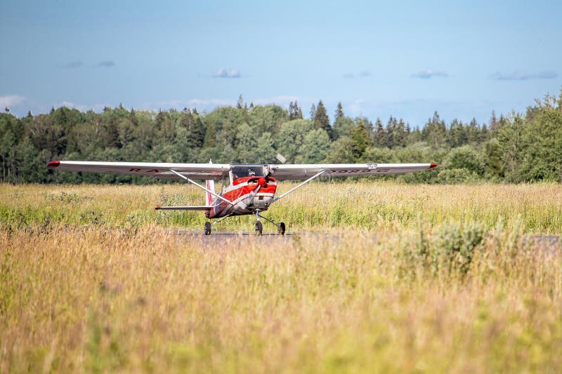 A Red Cessna 150 Takes Off from the Runway Editorial Stock Photo ...