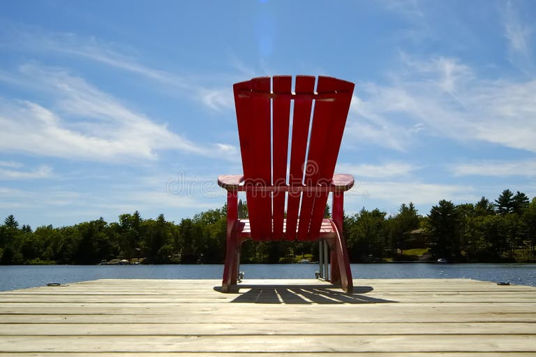 Red Chair on Deck Horizontal Stock Image - Image of lone, cottages: 155077
