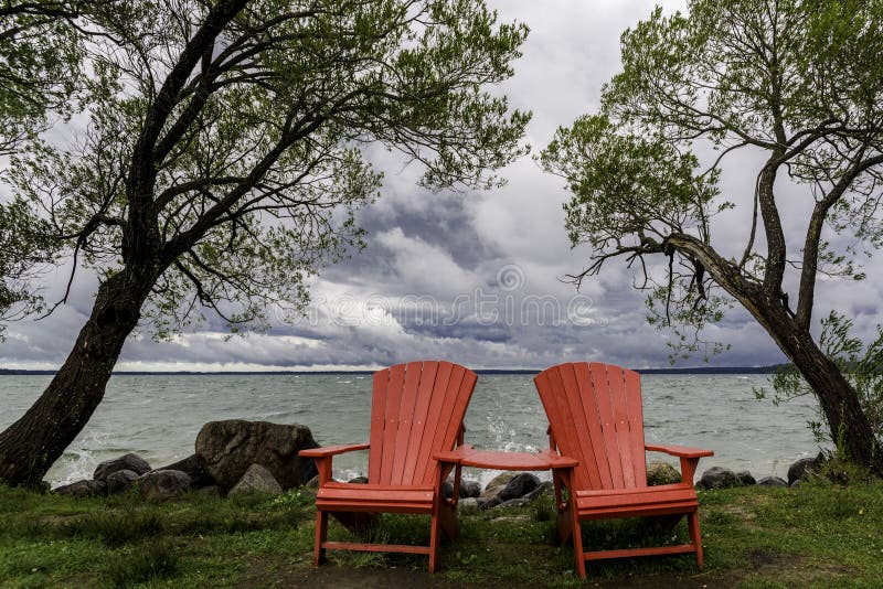 Red Chairs stock image. Image of lake, mountain, summer - 77153401