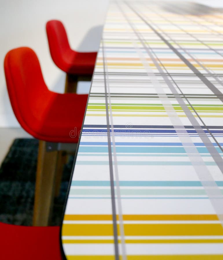 Red Chairs and Table Decorated with Colored Lines Stock Photo - Image ...