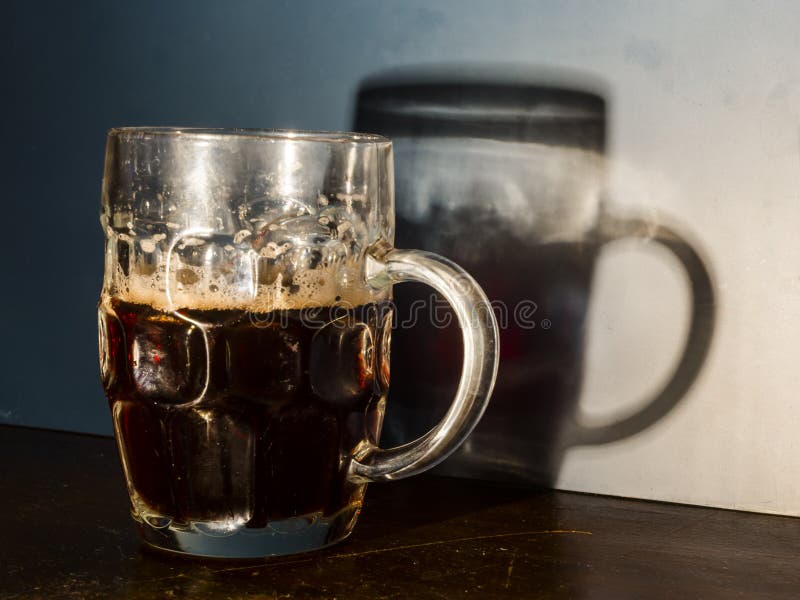 Belgian Cherry Beer with Shadow in the Background Stock Image - Image ...