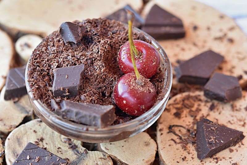 Red Cherry in Chocolate Chips and Dark Chocolate Pieces. Dessert Stock ...