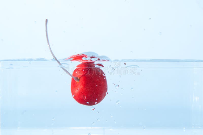 Red cherry in water stock photo. Image of drink, beverage - 11049910