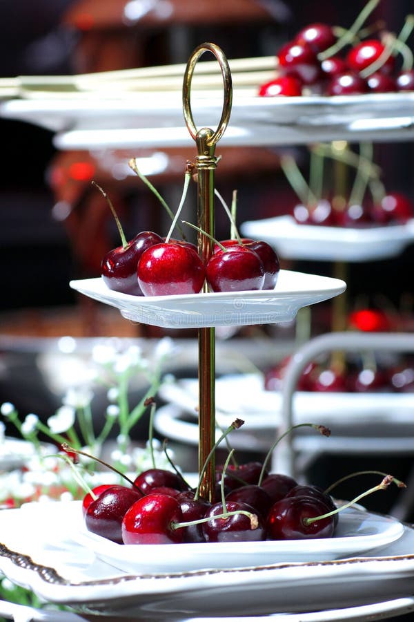 Red cherry on white dish stock photo. Image of closeup - 26214980