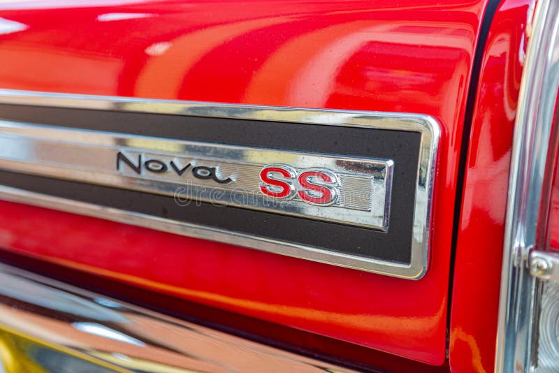 Red Chevrolet Nova SS Retro Car from the 60s. Emblem View Editorial ...