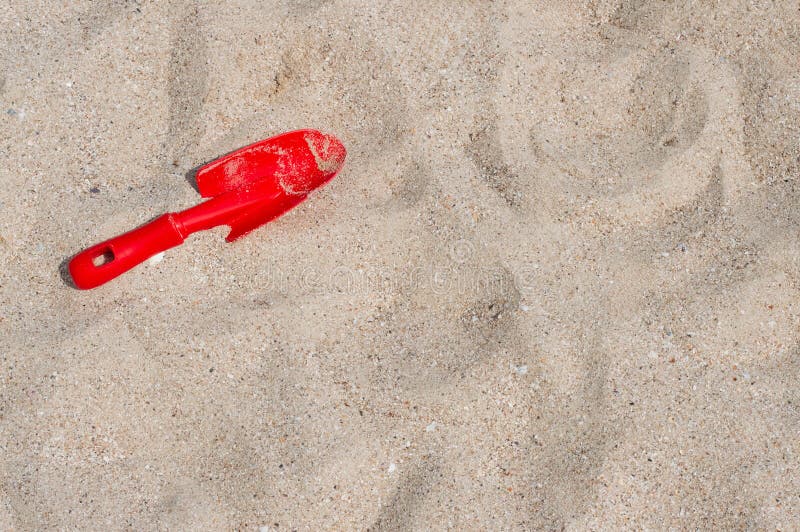 A Red Children S Shovel Lies on the Sand Stock Image - Image of spade ...