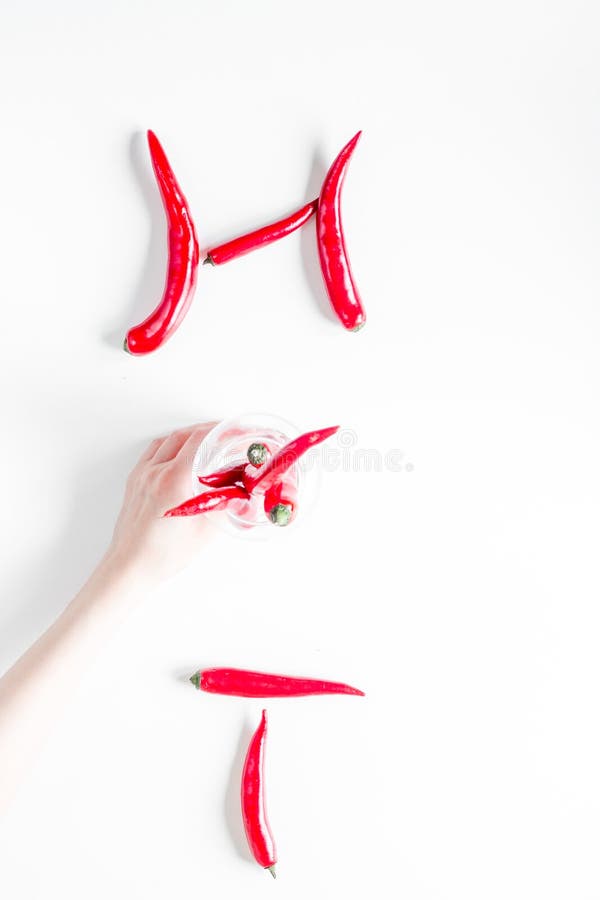 Red Chili Pepper Hot Text Design on White Table Background Top View ...