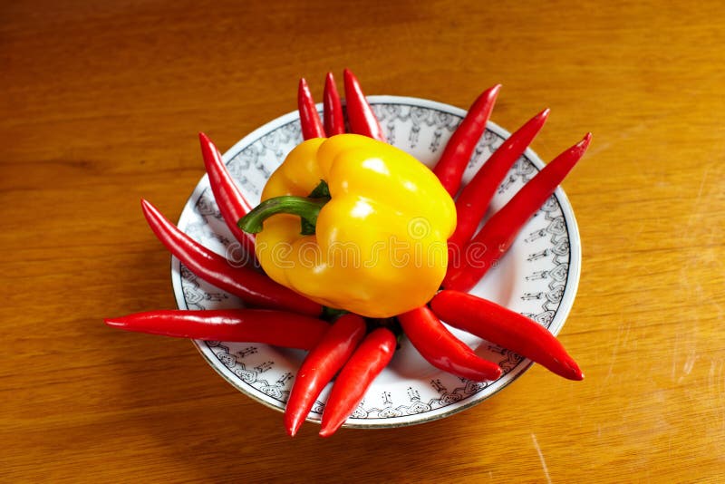 Red Chili Pepper and Yellow Bell Pepper Stock Image - Image of root ...