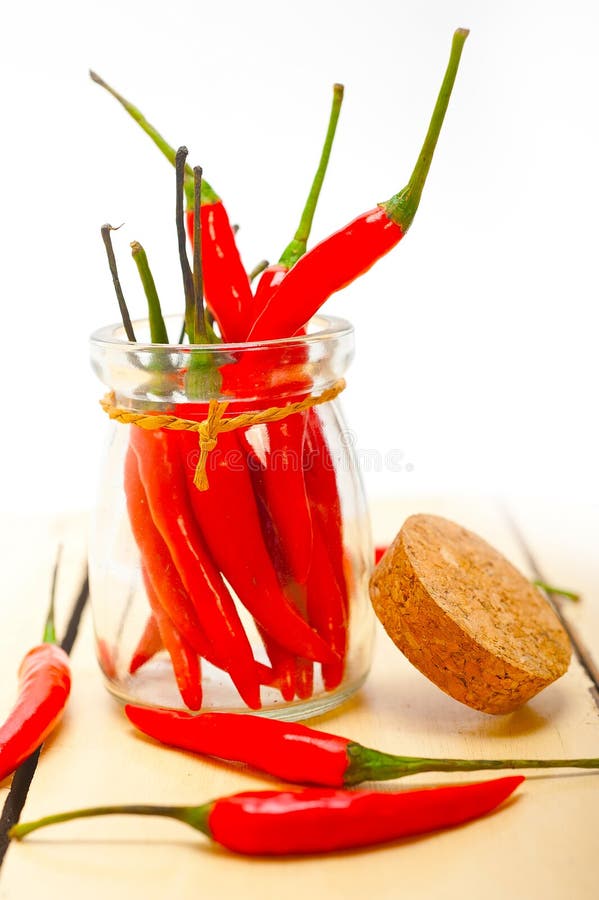 Red Chili Peppers on a Glass Jar Stock Image - Image of pepper, rustic ...