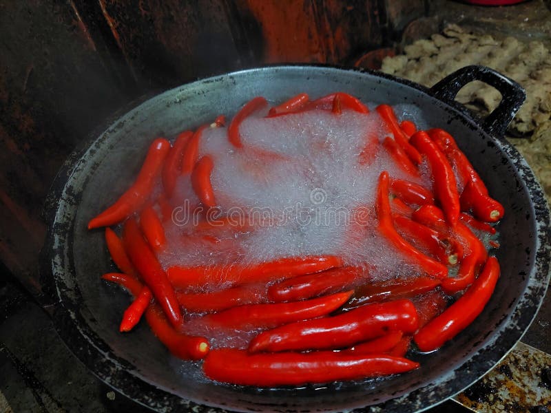 Red Chilies Being Boiled in Boiling Water Stock Photo - Image of boiled ...