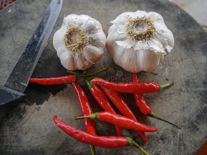 Chilli and garlic stock image. Image of kinfe, chilli - 158759369