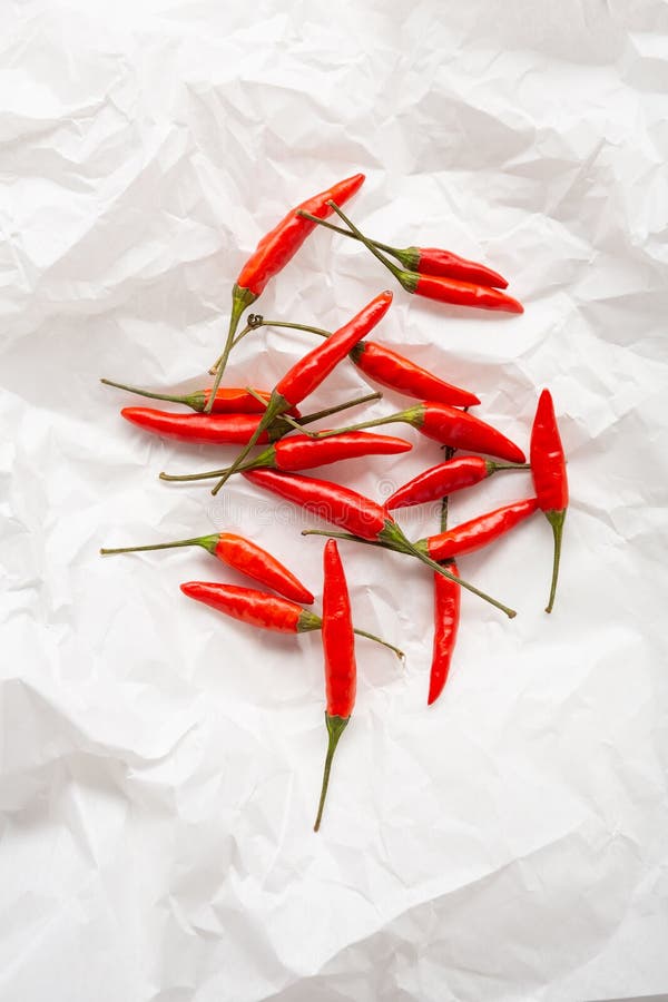 Red Chilli Pepper Close-up on White Paper Stock Image - Image of ...