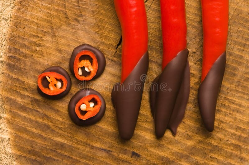 Red Chilli Pepper with Dark Chocolate Stock Photo - Image of white ...