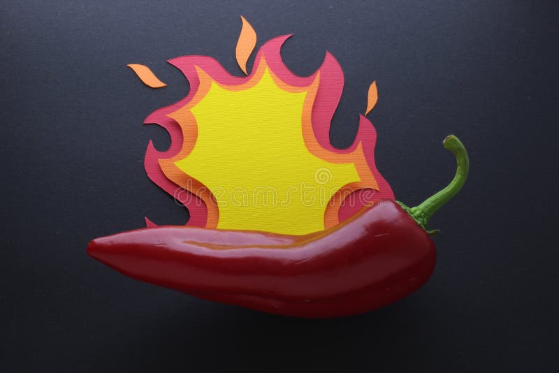 Red Chilli Pepper with Painted Fire on Black Craft Paper Background ...