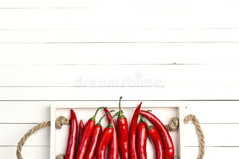 Red Chilli Pepper in the Tray on a White Table Witgh Copy Space. Stock ...