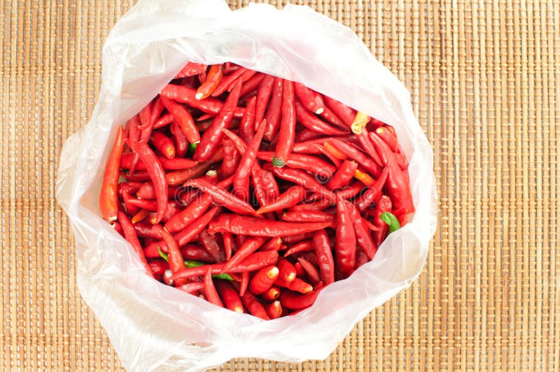 Red Chilli in a Plastic Bag, Hung beside the Car Stock Image - Image of ...